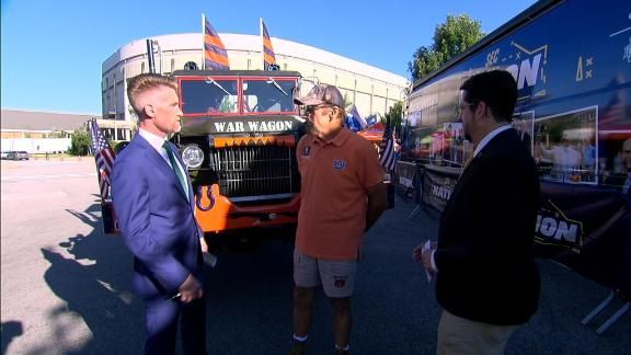 Marty & McGee marvel at the Auburn War Wagon - Southeastern Conference