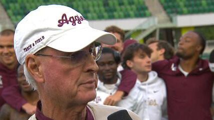 Pat Henry accepts Texas A&M's national championship trophy ...